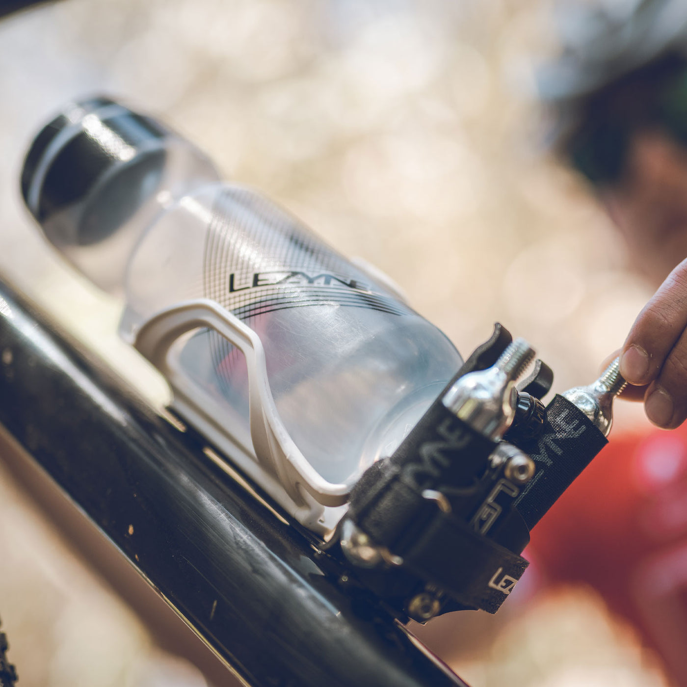 LEZYNE FLOW STORAGE ADAPTER | BIKE BOTTLE CAGE TOOL HOLDER